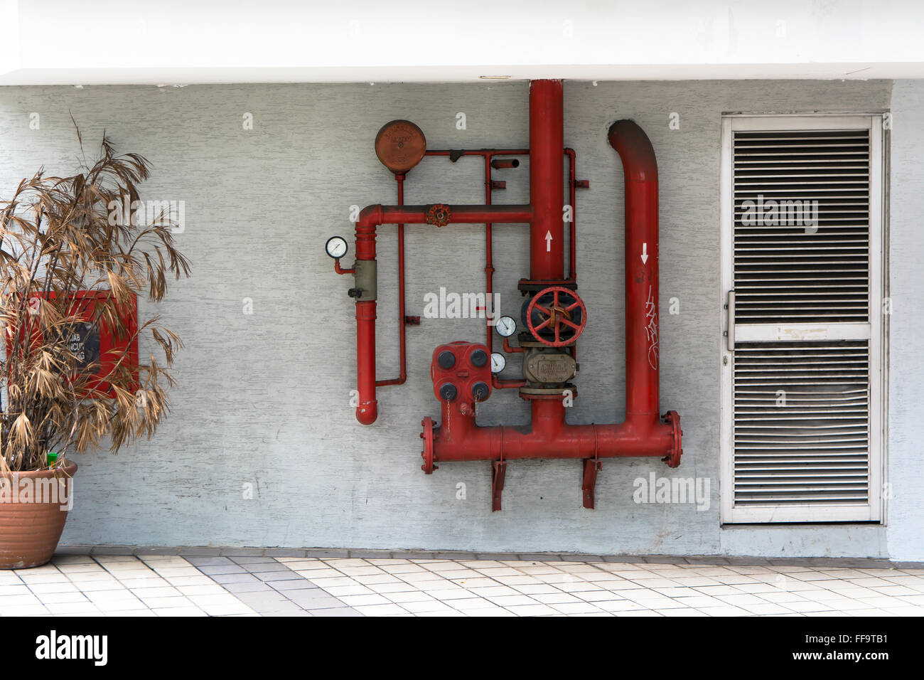 Fire extinguishing Pipeline On Building Exterior Stock Photo - Alamy