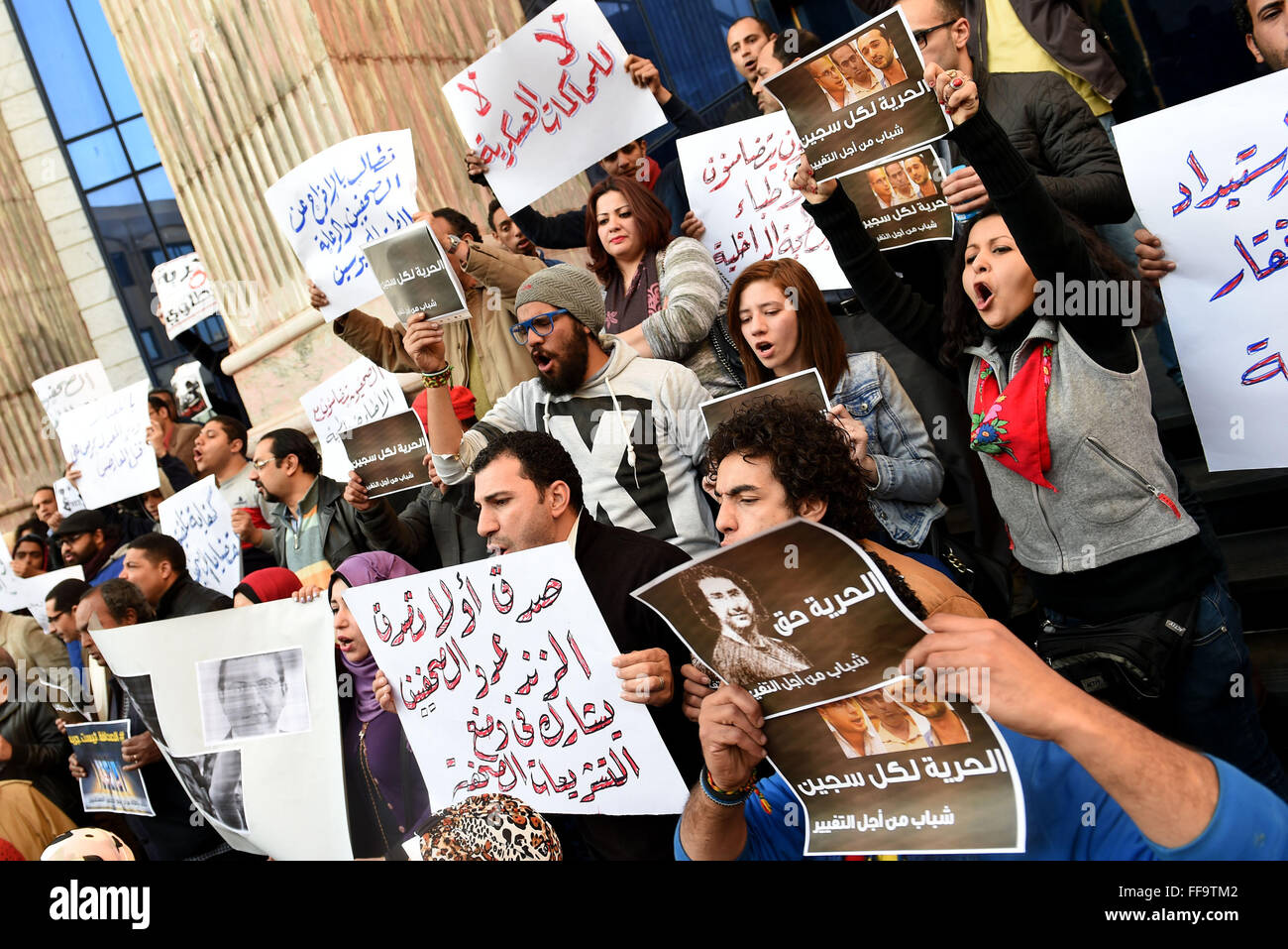Cairo. 11th Feb, 2016. Protesters hold posters during a protest ...