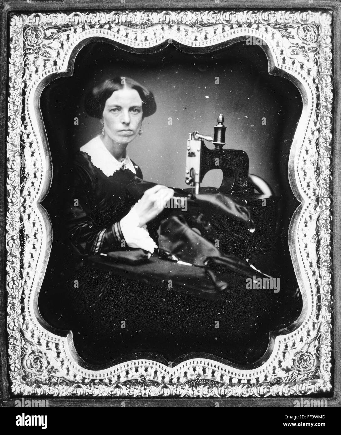 SEWING MACHINE, c1853. /nSeamstress with an 1853 model Grover and Baker ...