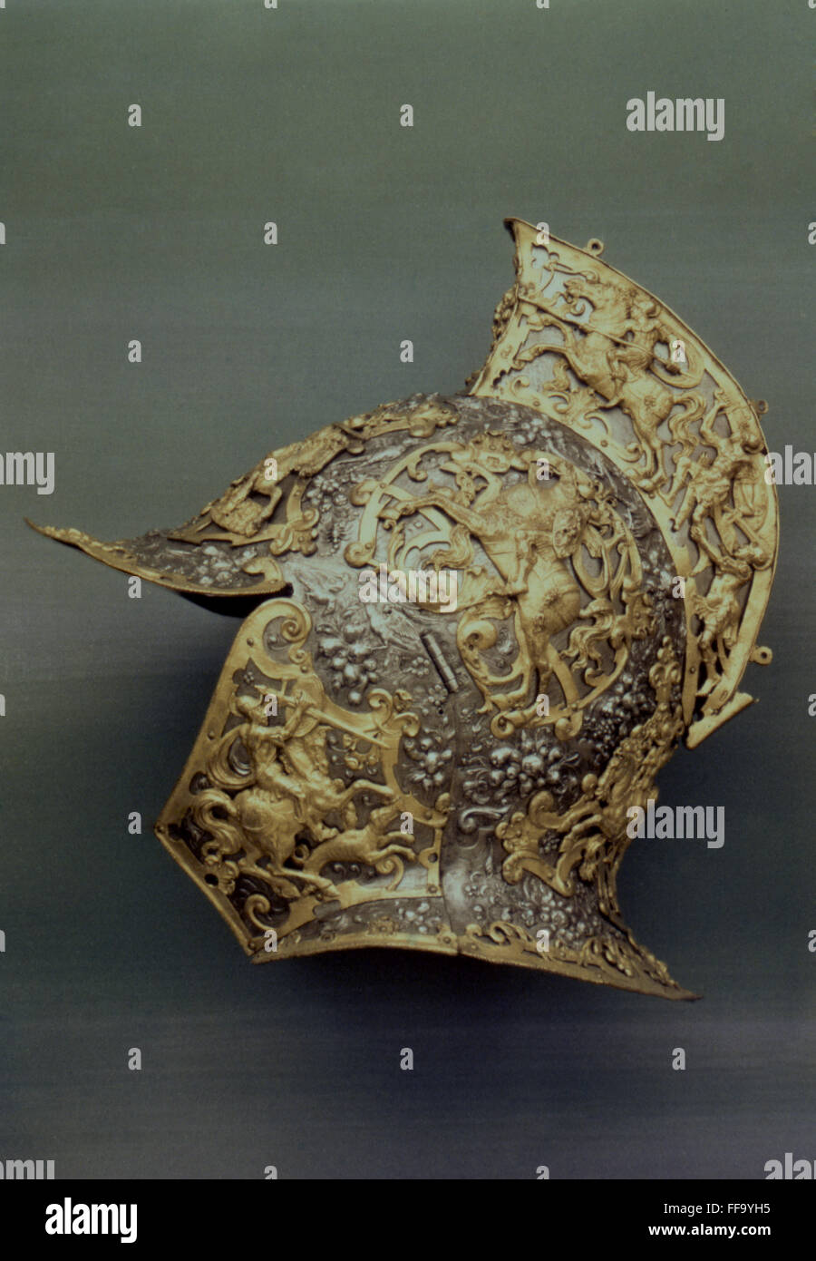 HELMET, 1599. /nParade burgonet. Steel embossed with copper gilt ...