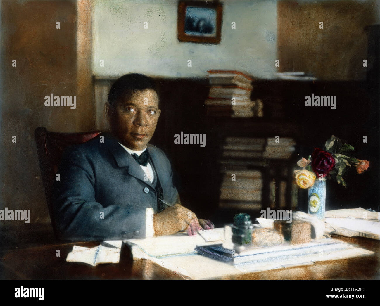 BOOKER T. WASHINGTON /n(1856-1915). American educator in his office at ...