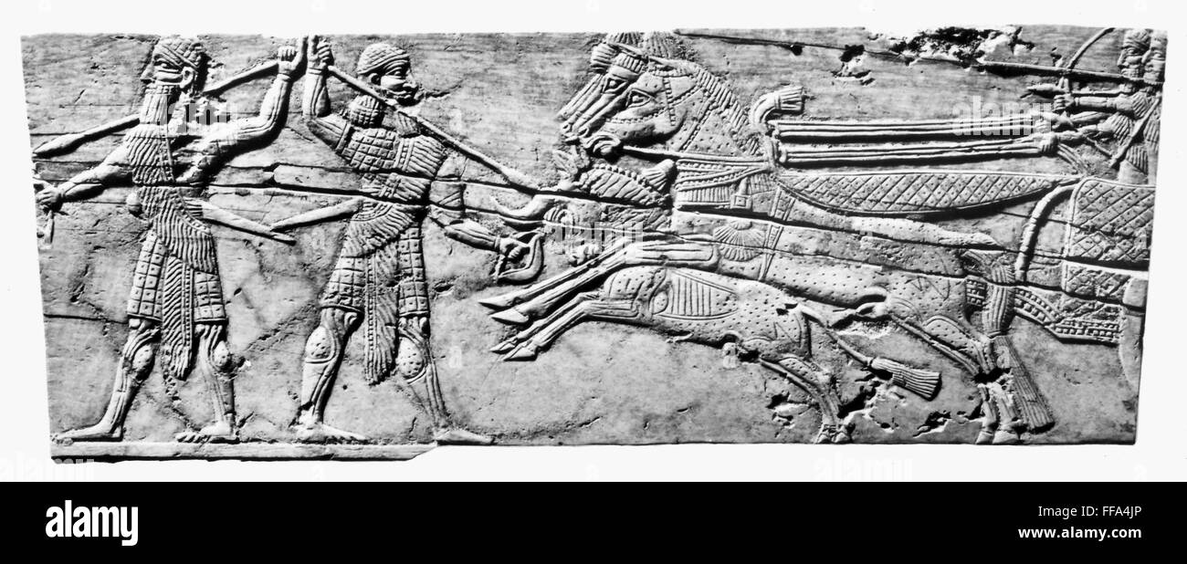 ASSYRIA: HUNTING SCENE. /nHunting scene fragment from an ivory panel ...