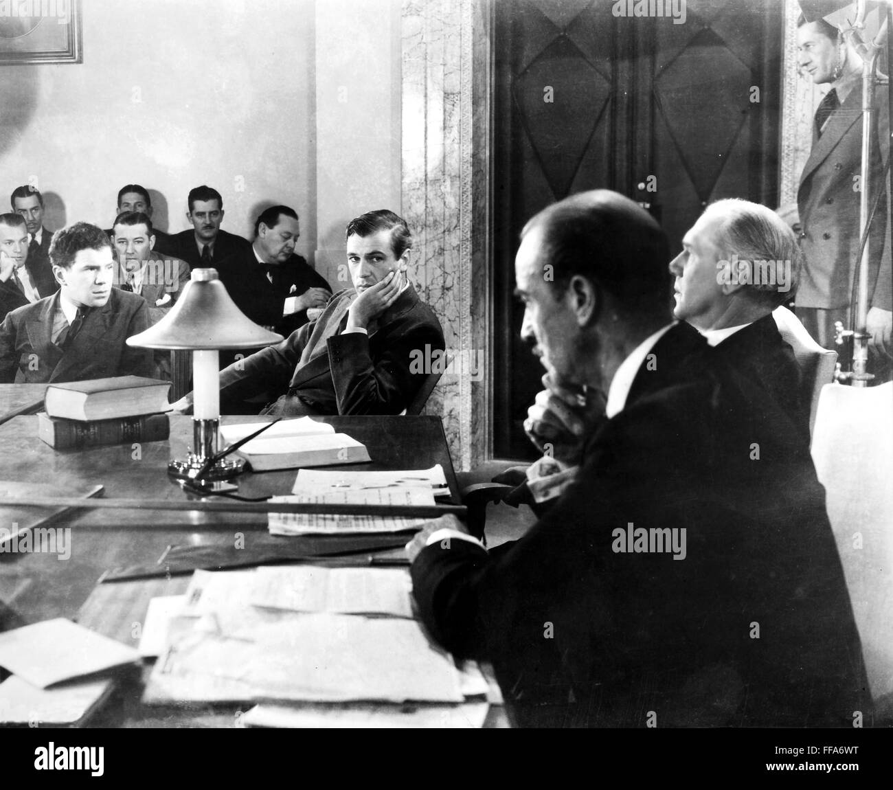 MR. DEEDS GOES TO TOWN. /nGary Cooper, as Longfellow Deeds (with hand to face), and Lionel ...