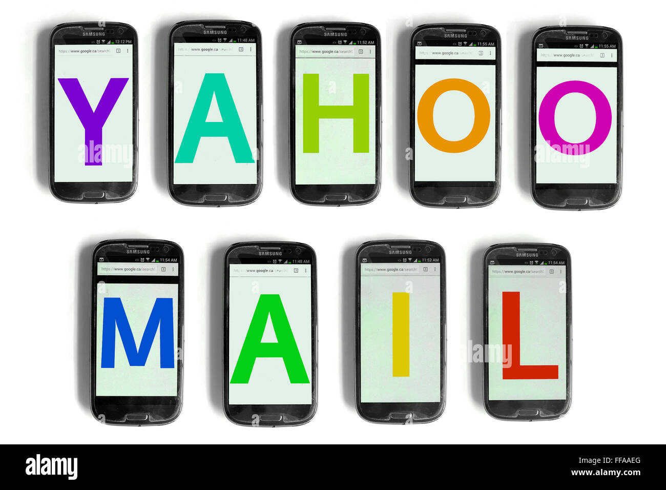Yahoo Mail on the screens of smartphones photographed against a white ...