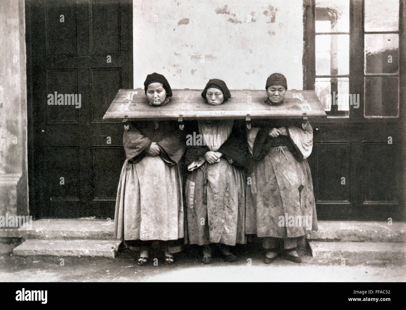 CHINA: PUNISHMENT, 1907. /nThree women in the 'cangue,' or collar of ...