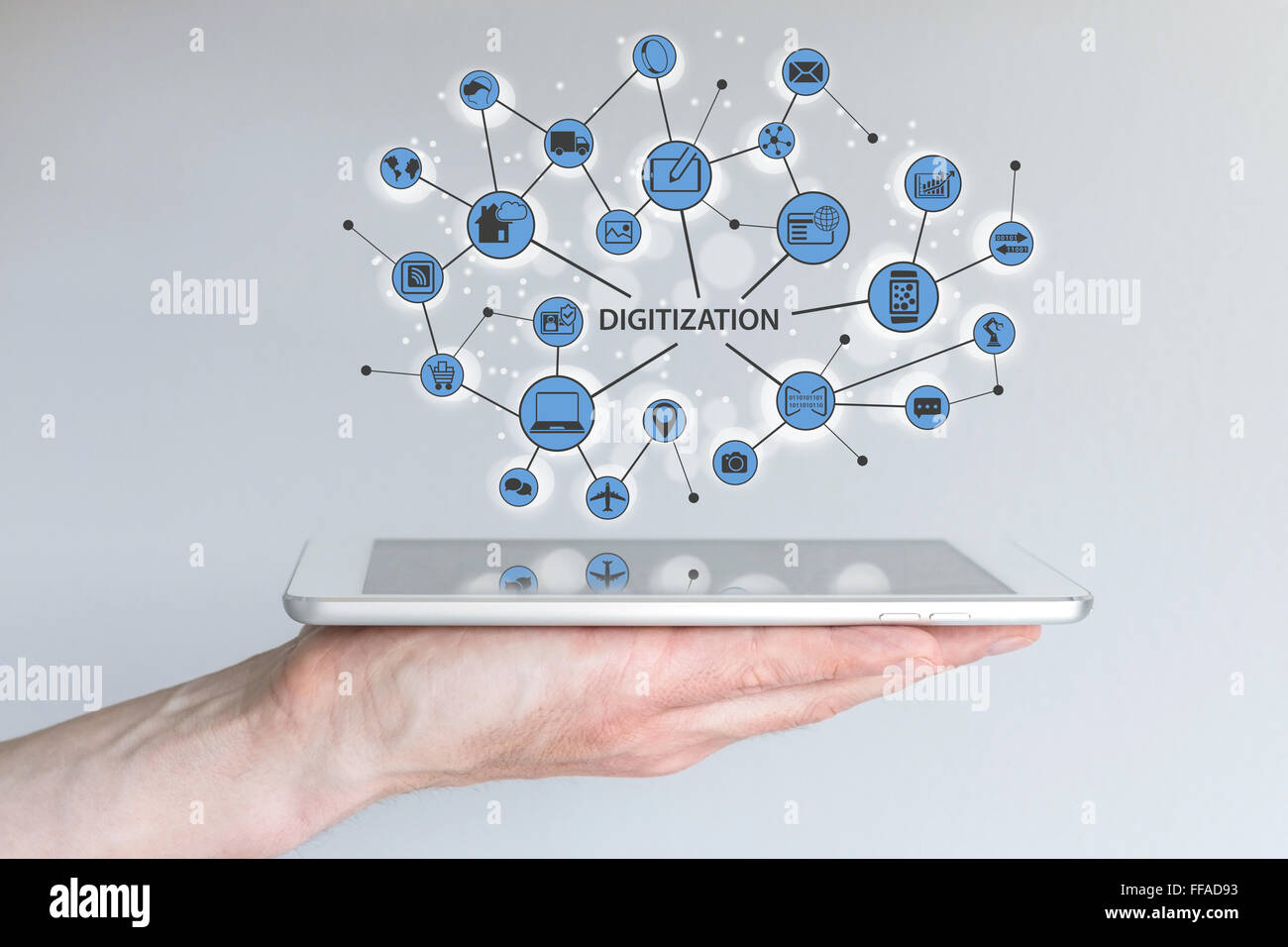 Digitization and digital disruption concept. Male hand holding modern ...