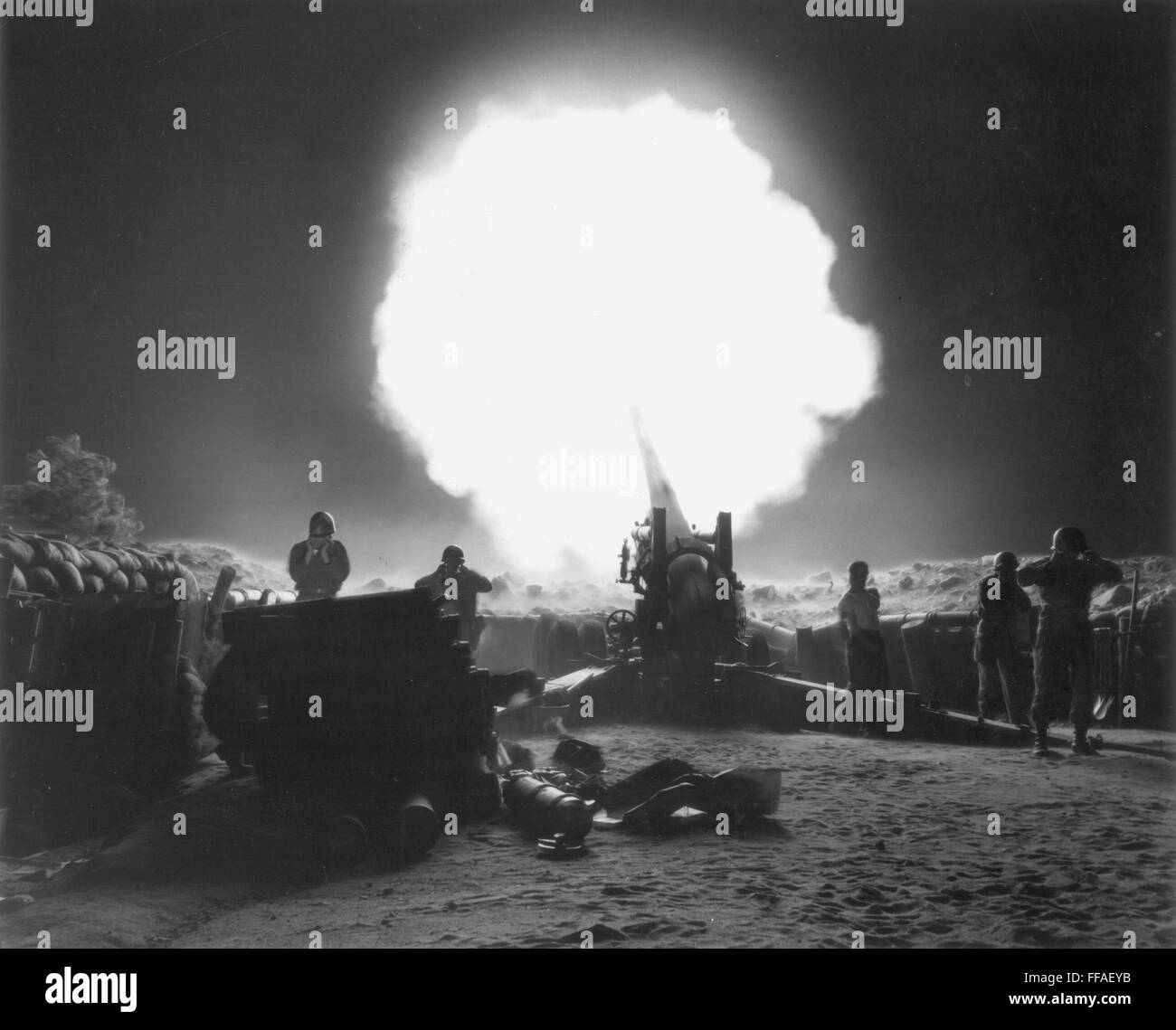 KOREAN WAR, 1952. /nA U.S. Army gun crew blasts off a howitzer at the ...