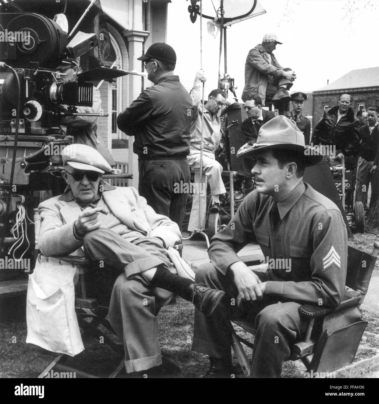JOHN FORD (1895-1973). /nAmerican motion-picture director. Ford (seated ...