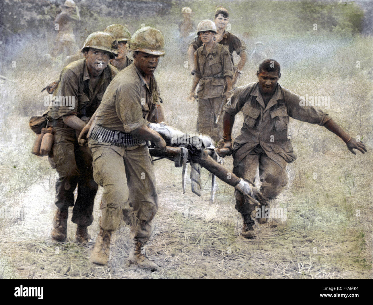 VIETNAM WAR, 1969. /nAn American soldier, wounded by an exploding land ...