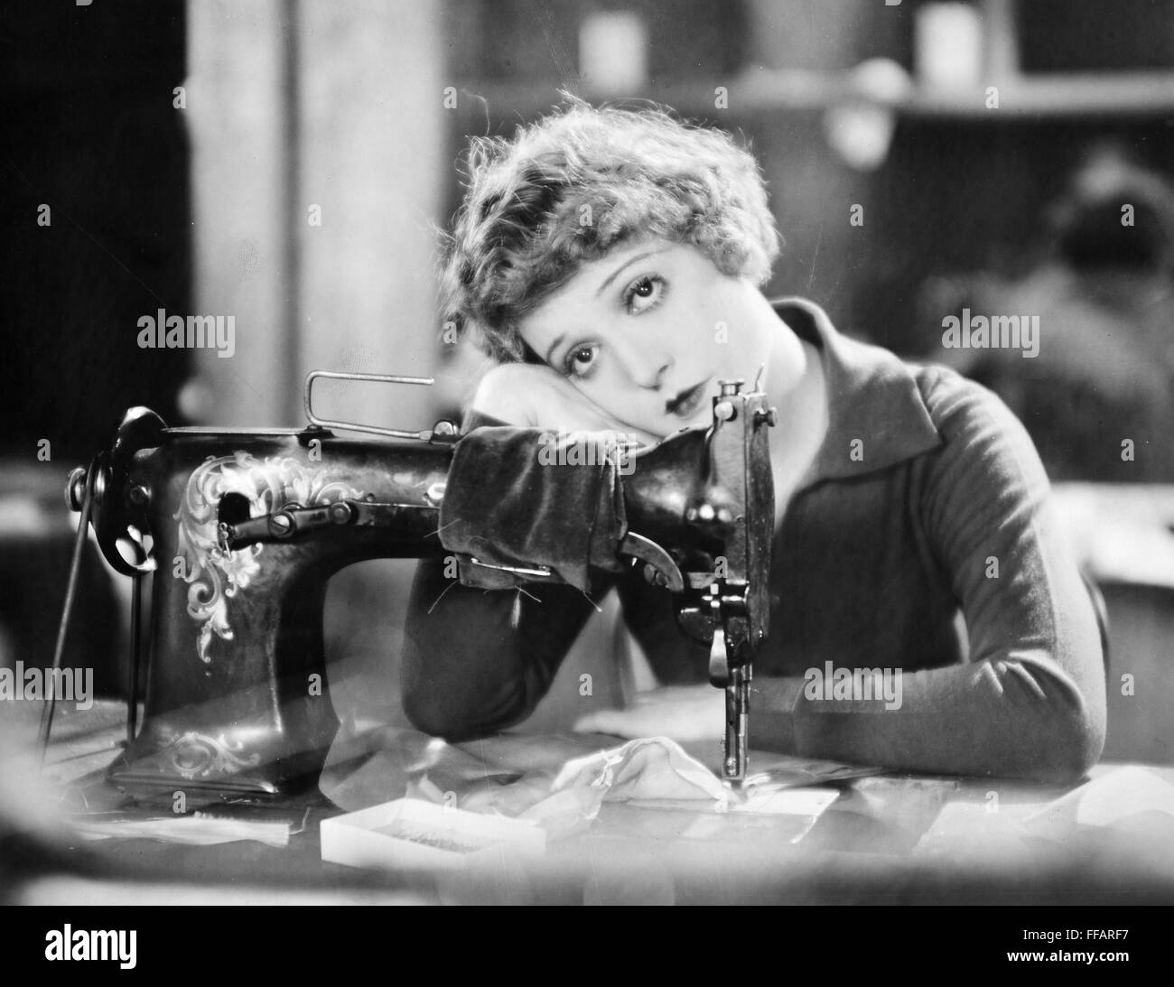 SILENT FILM STILL: SEWING Stock Photo - Alamy