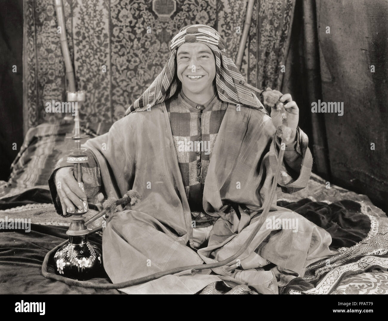 SILENT FILM STILL: SMOKING./nJohnny Hines in 'All Aboard,' 1927 Stock ...