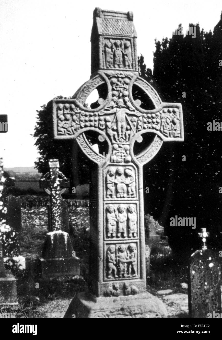 CELTIC STONE CROSS. /nStone cross of Muiredach with scriptural scenes ...