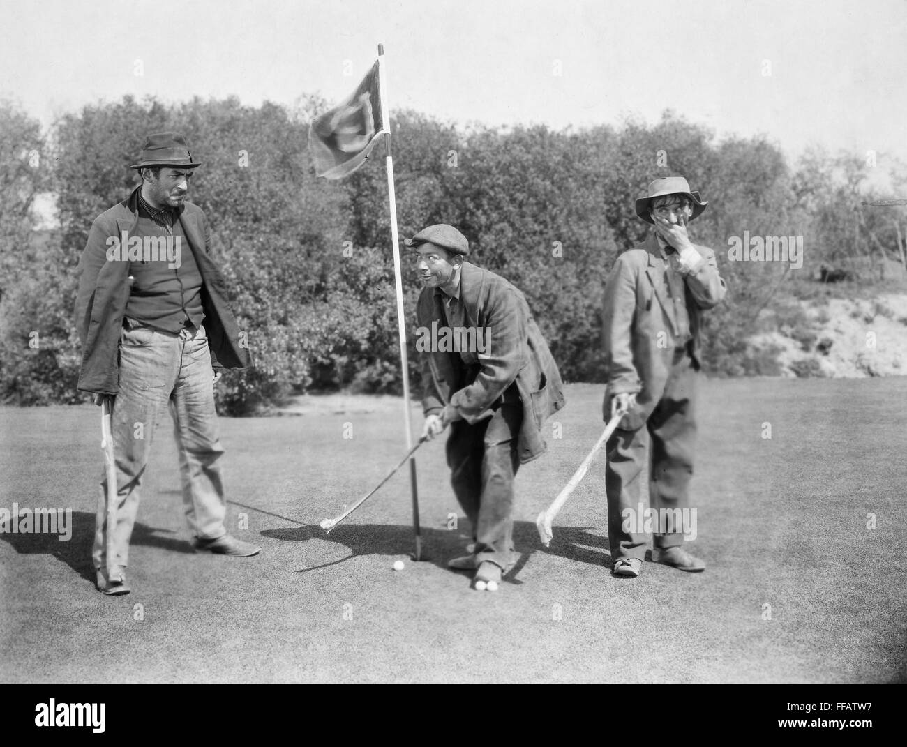 SILENT FILM STILL: GOLF Stock Photo - Alamy
