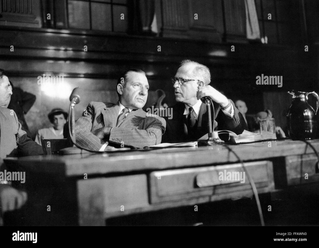 FRANK COSTELLO (1893-1973). /nAmerican gangster. Conferring with his ...