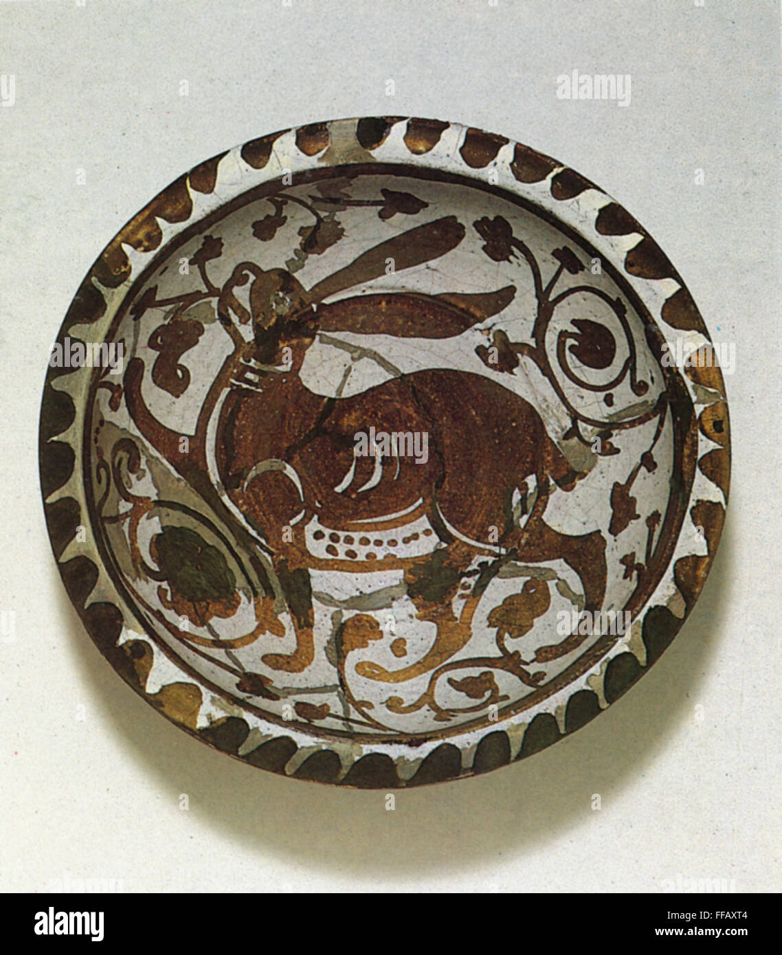 ARAB POTTERY, 11th CENTURY. /nBowl depicting a hare. Tin-glazed ...