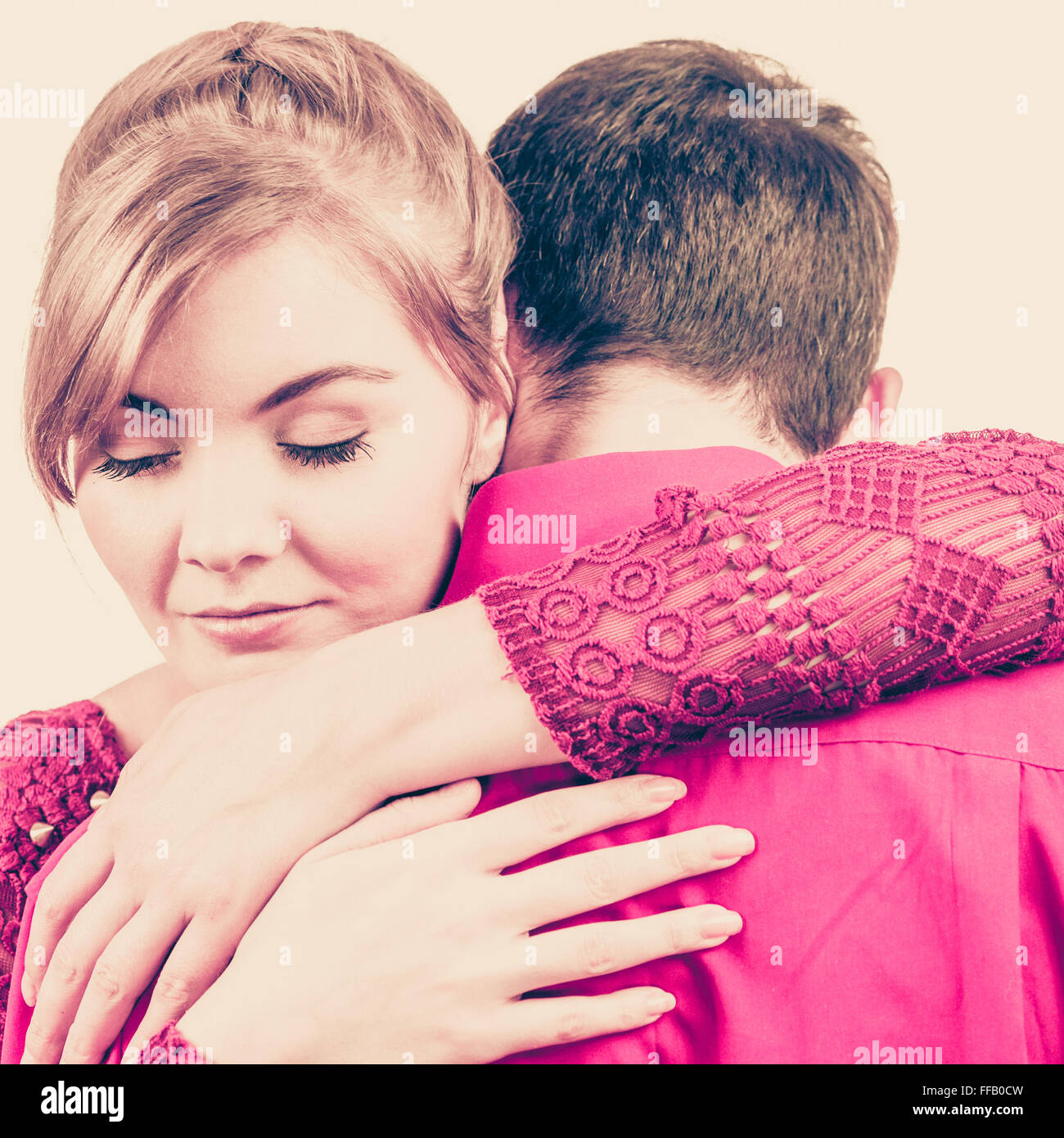 Couple hugging. Woman is sad and being consoled by his partner. Man ...