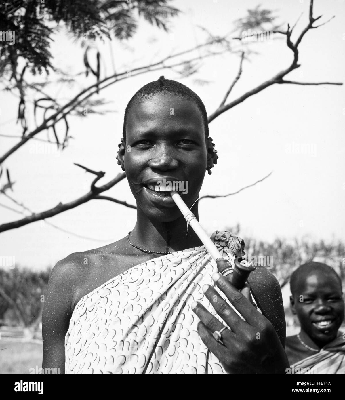 SUDAN: LATUKA WOMAN. /nA Latuka woman with a pipe at Torit, about 100 ...