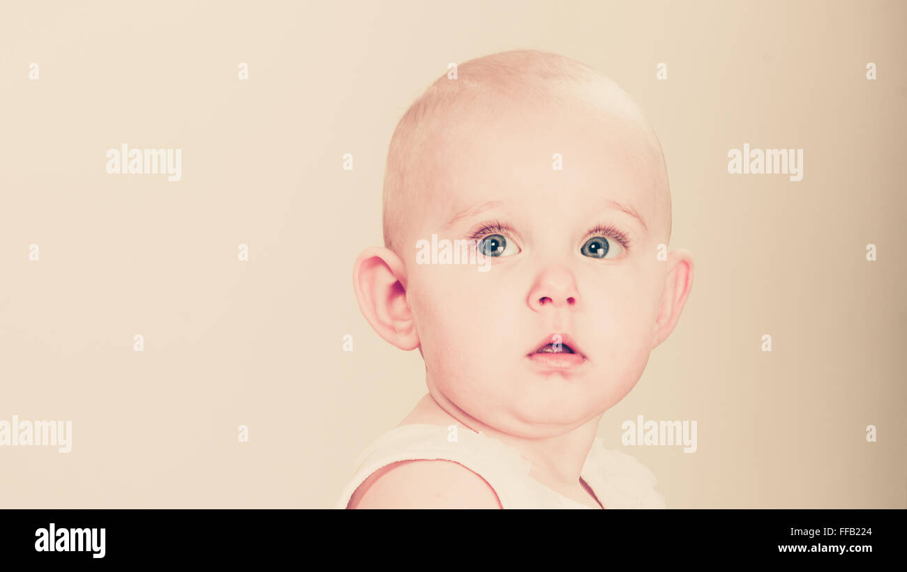 Lovely little child girl. Portrait of cute beauty sweet baby. Face ...