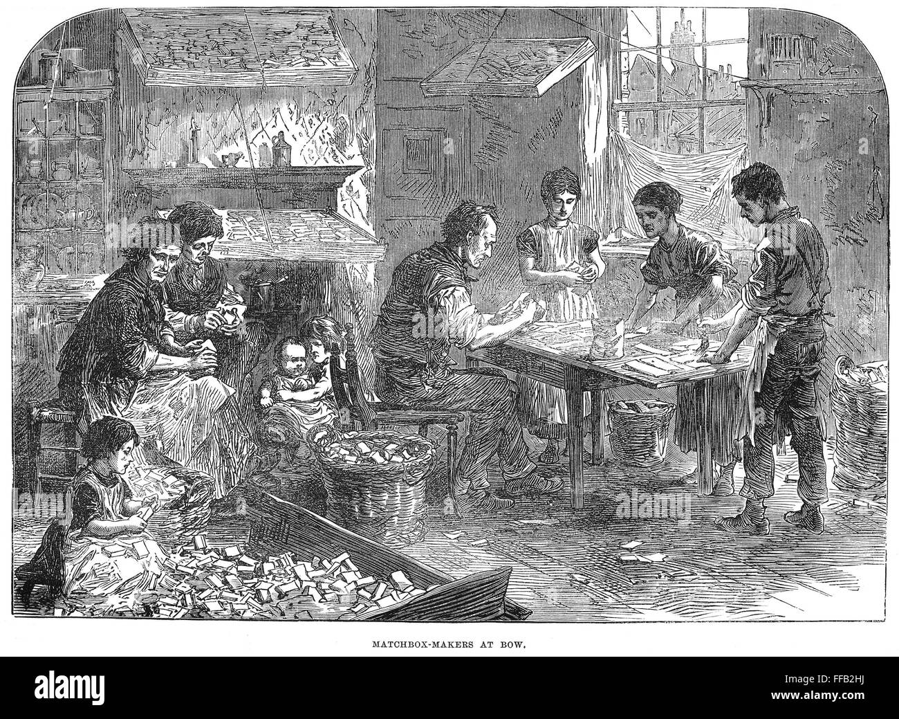 HOME INDUSTRY, 1871. /nA family of matchbox makers working in their ...