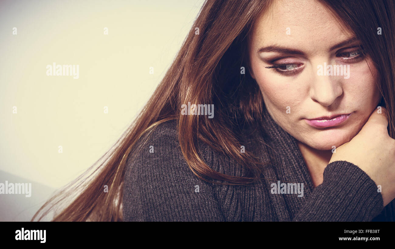 Face emotional expression of sadness. Unhappy worried thinking woman ...