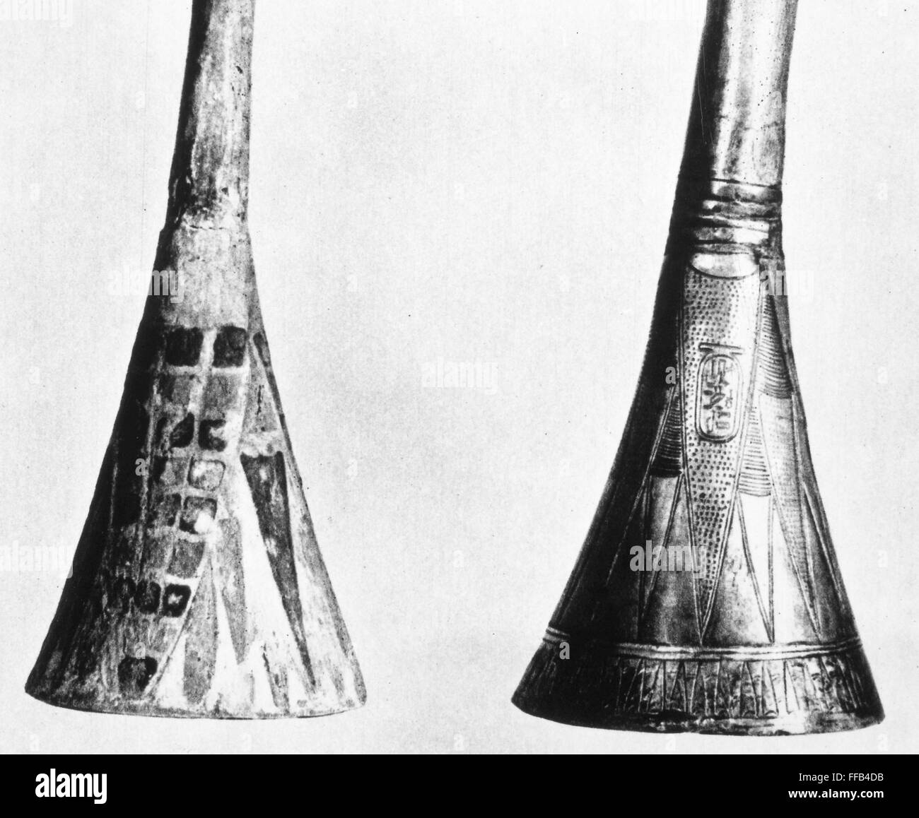 EGYPTIAN SILVER TRUMPET. /nThe bell of a silver trumpet, decorated with ...
