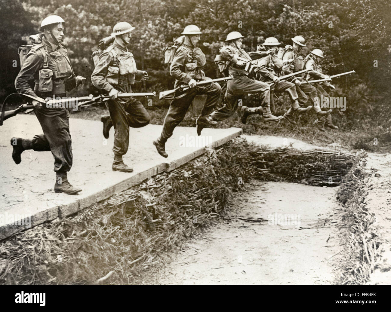 WORLD WAR II: GUARDSMEN. /nBritish Guardsmen in full kit taking an ...