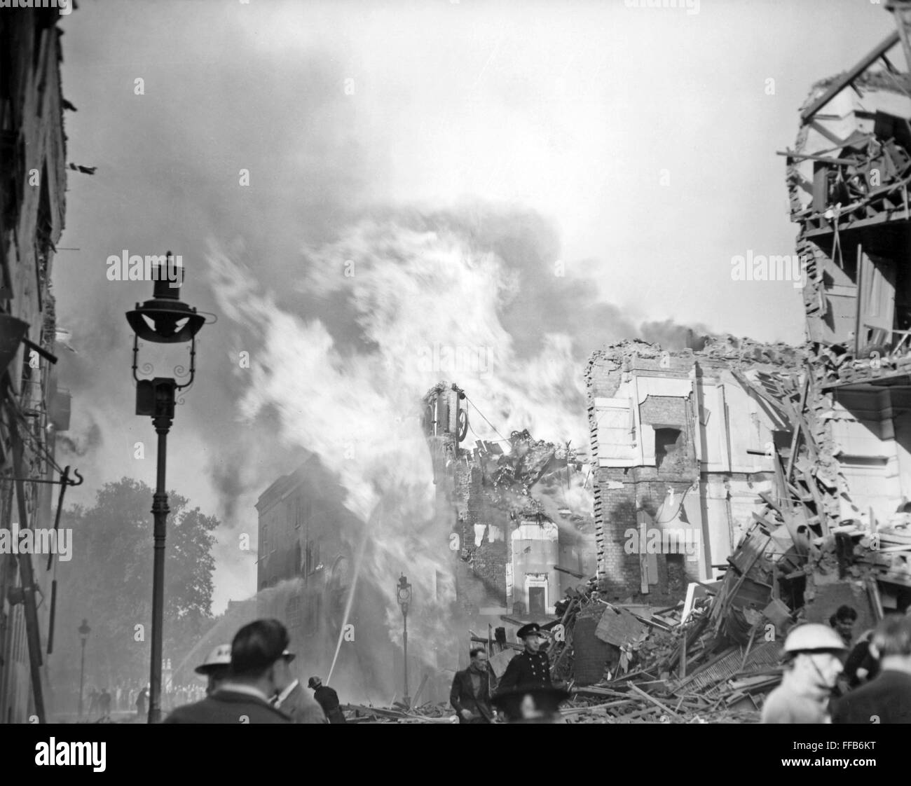LONDON BOMBING, 1944. /nFiremen fight flames at Regency Place and ...