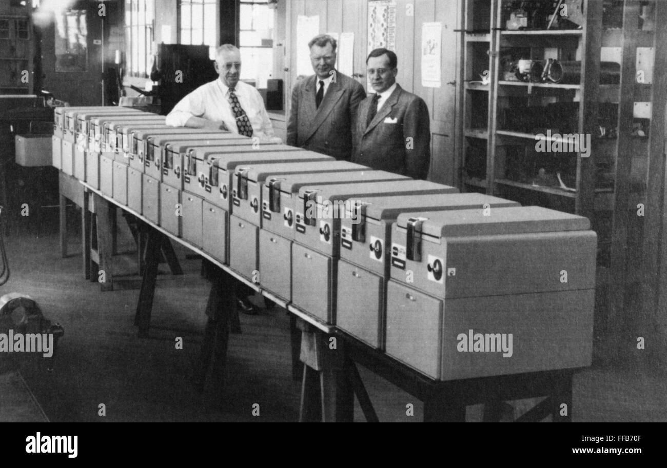 PHOTOCOPY MACHINES, 1950. /nInventor Chester Carlson (center) with ...