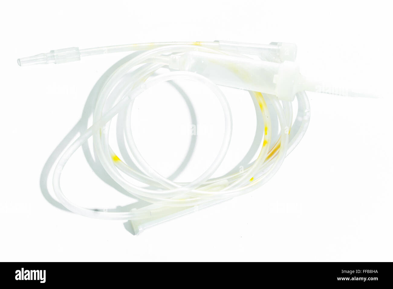 plastic infusion set isolated on white Stock Photo - Alamy