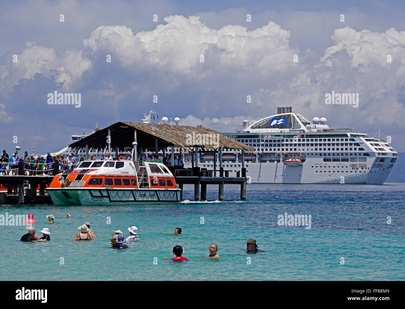 Sea Princess cruise ship passengers swimming at Doini Island in Papua ...