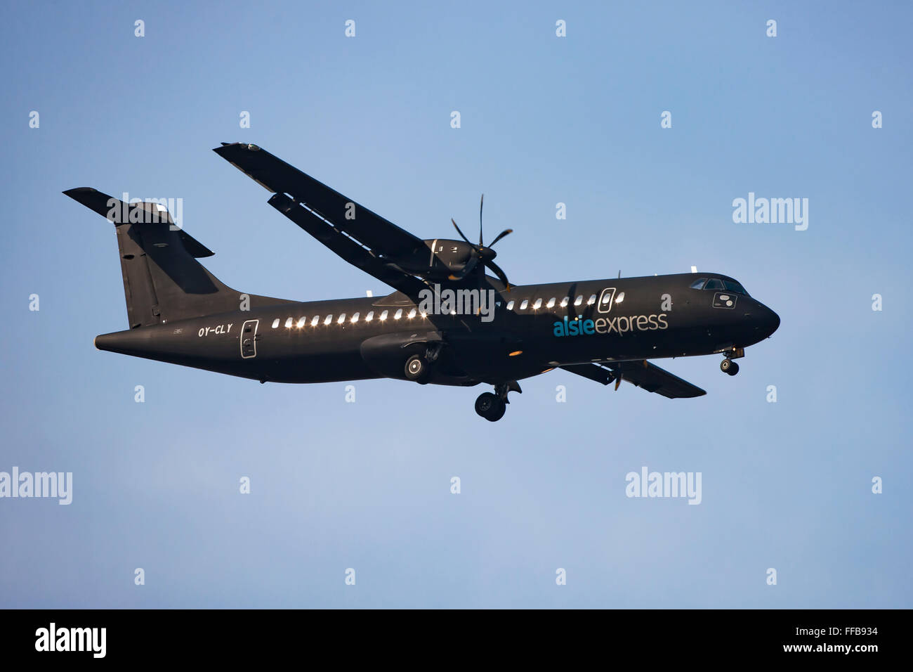 AlsieExpress or Alsie Express, airliner, in flight Stock Photo - Alamy