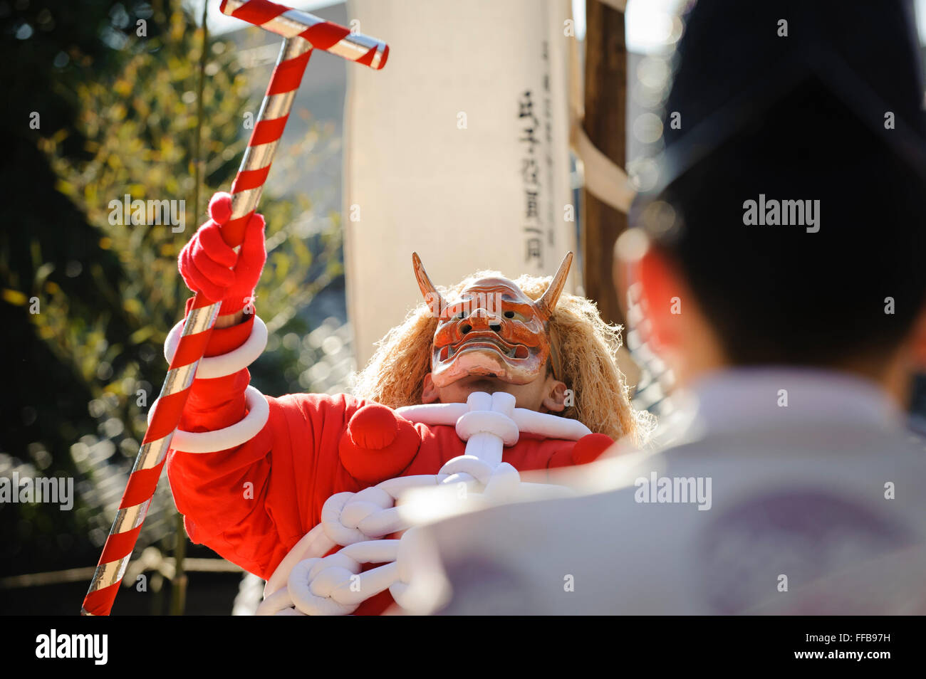 Toyohashi, Japan. 11th February, 2016. Aka-oni, the red demon, performs ...