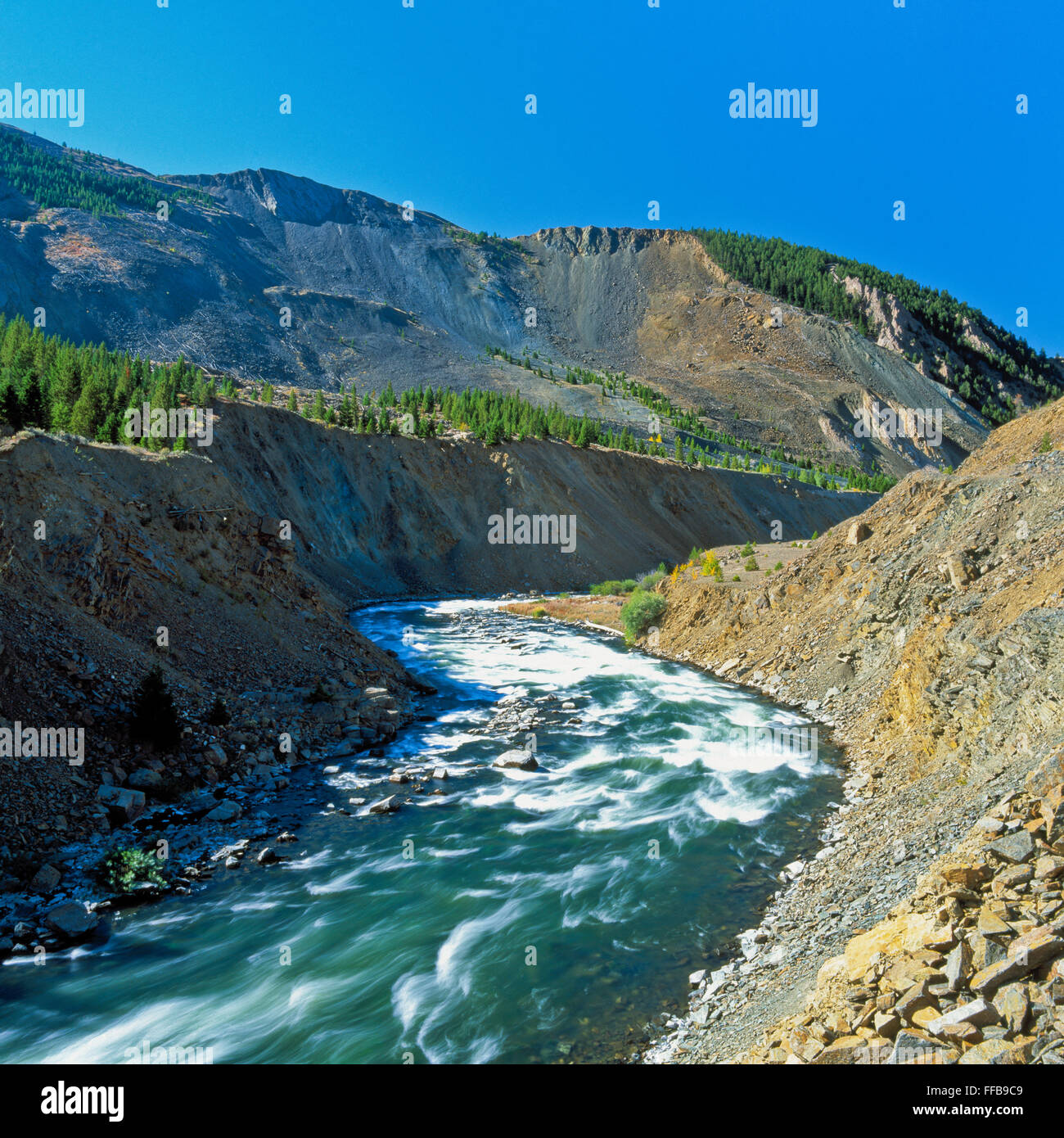 madison river flowing through a canyon carved through rubble at the ...
