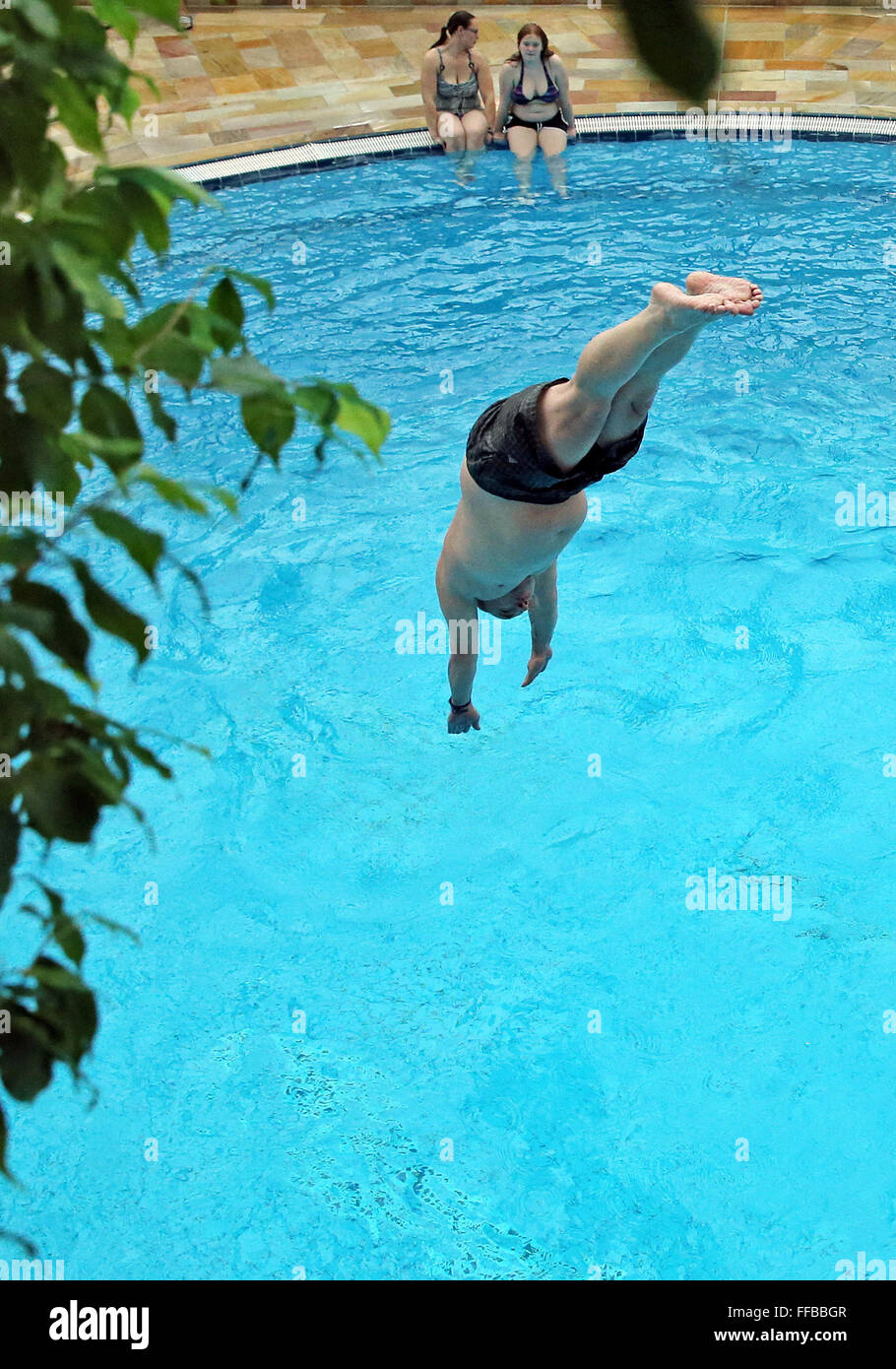 Bad Lausick, Germany. 09th Feb, 2016. A boy dives from a 3-meter diving ...