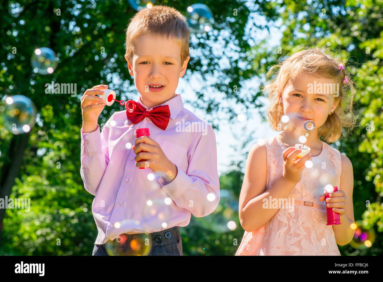 Child in bubbles hi-res stock photography and images - Alamy