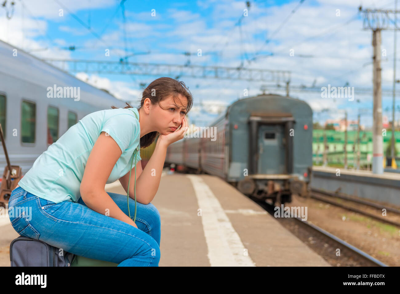 Portrait of distressed girl was late for his train Stock Photo - Alamy