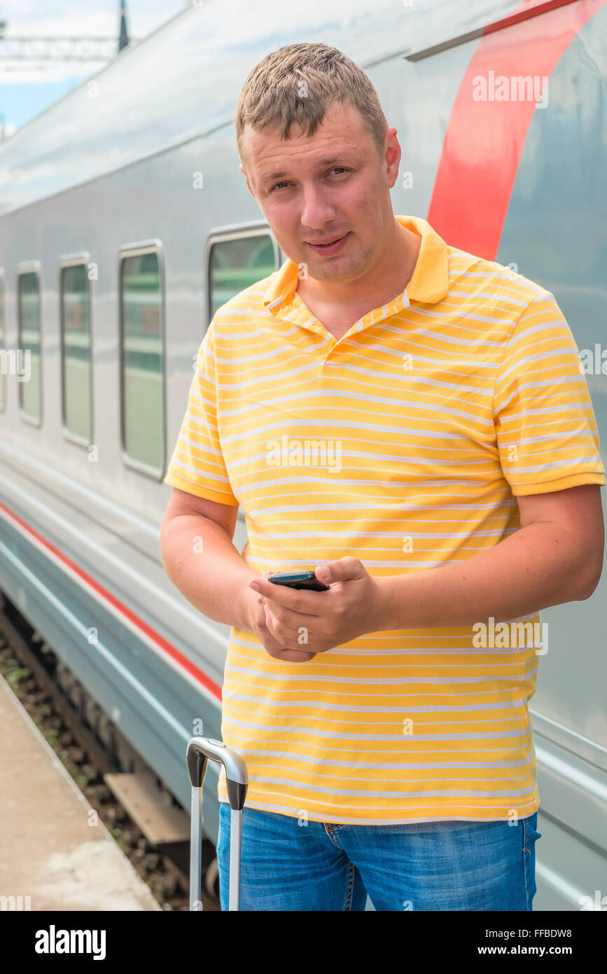 One man on a train platform hi-res stock photography and images - Alamy