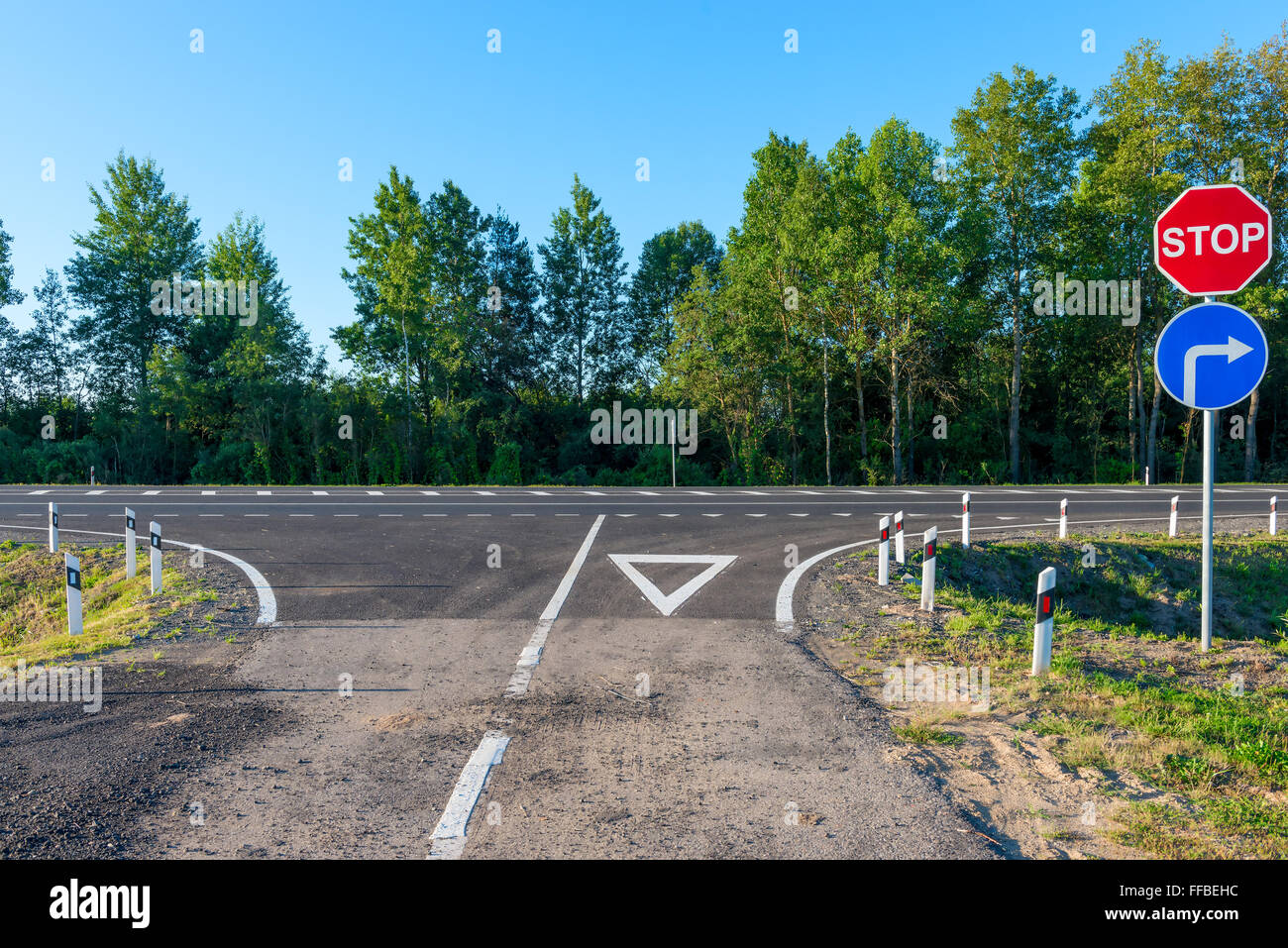 Stop sign country road intersection hi-res stock photography and images ...