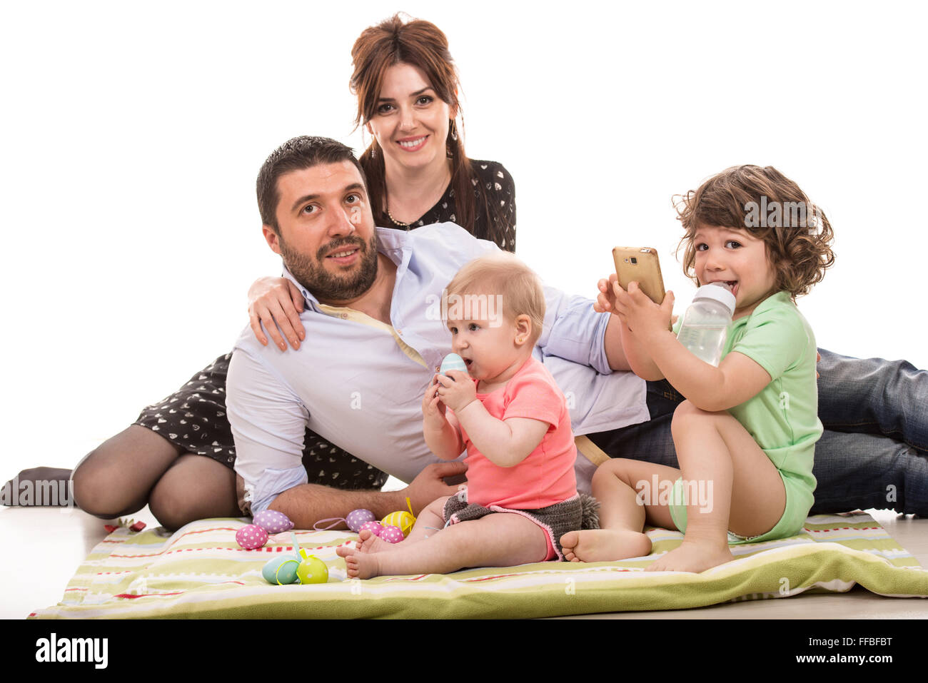 Portrait four happy family members hi-res stock photography and images ...
