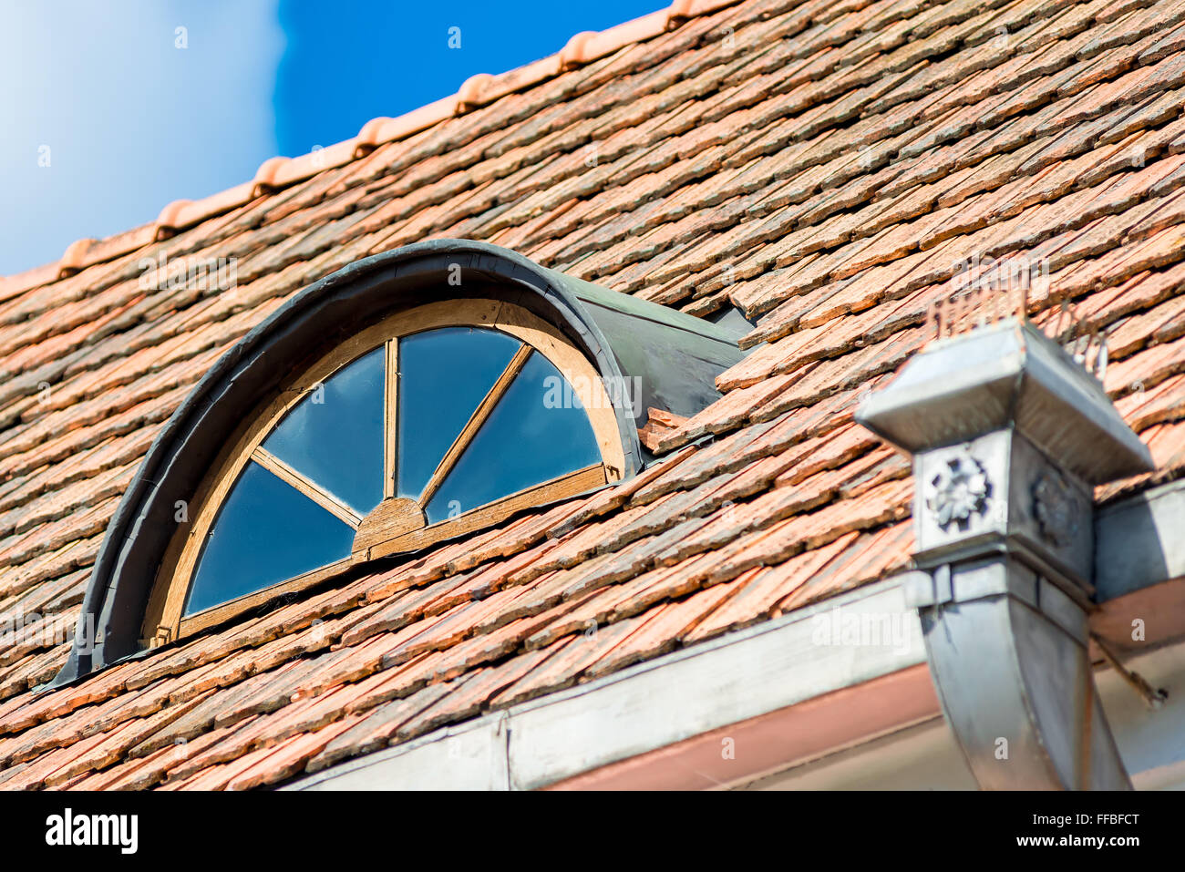 Vintage beautiful window in the attic under the roof of the house Stock ...