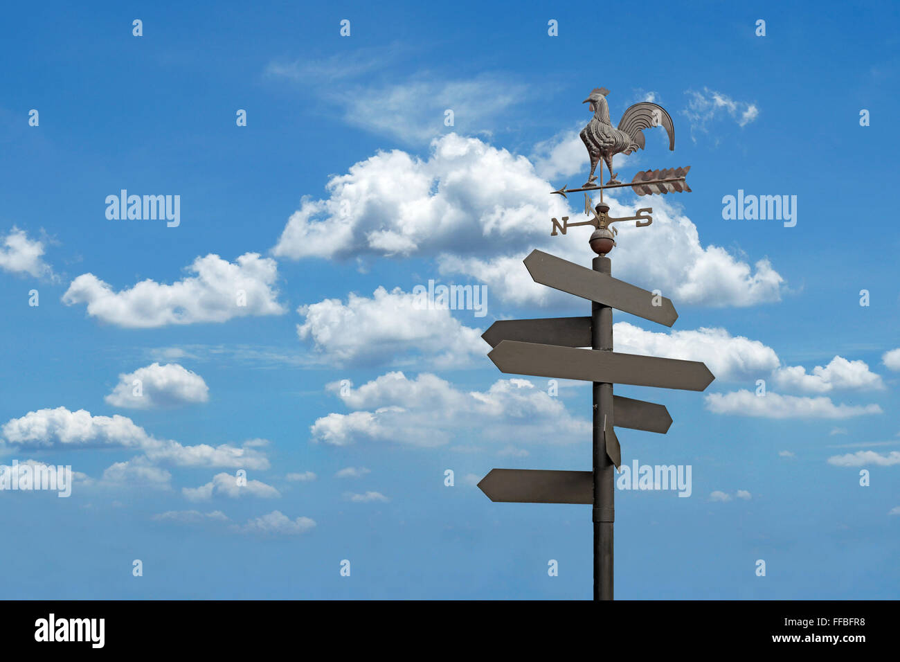 direction sign with blank spaces for text on beautiful sky background ...