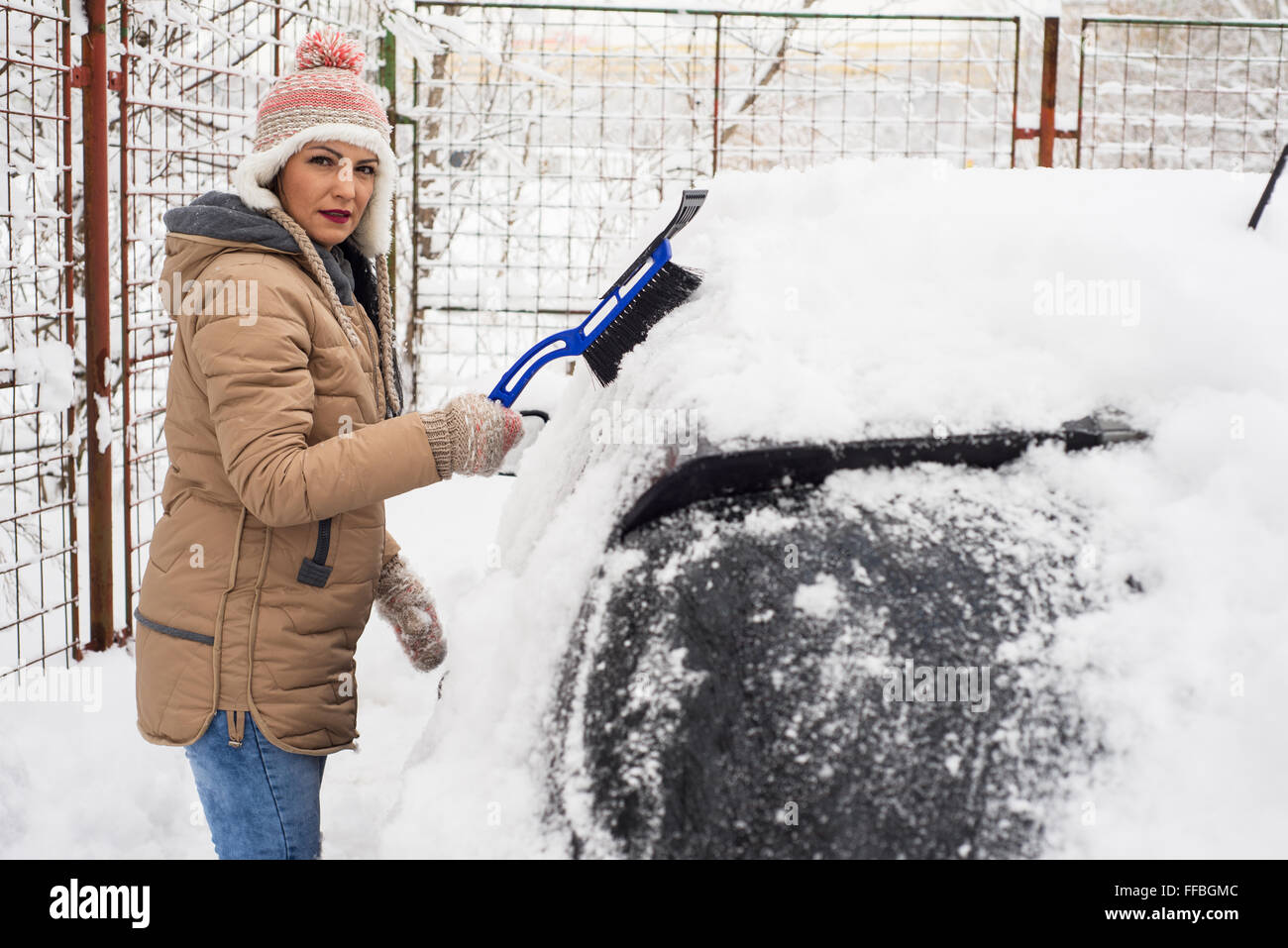 Person Wiping Snow From Car High Resolution Stock Photography and ...