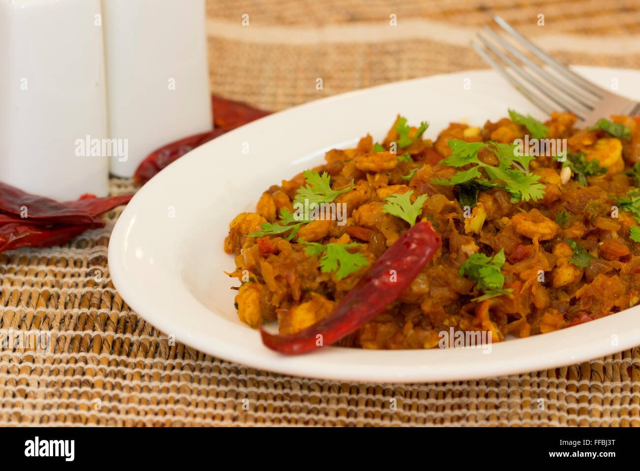 Goa is known for its seafood and goan chilli prawns is a stir fried ...