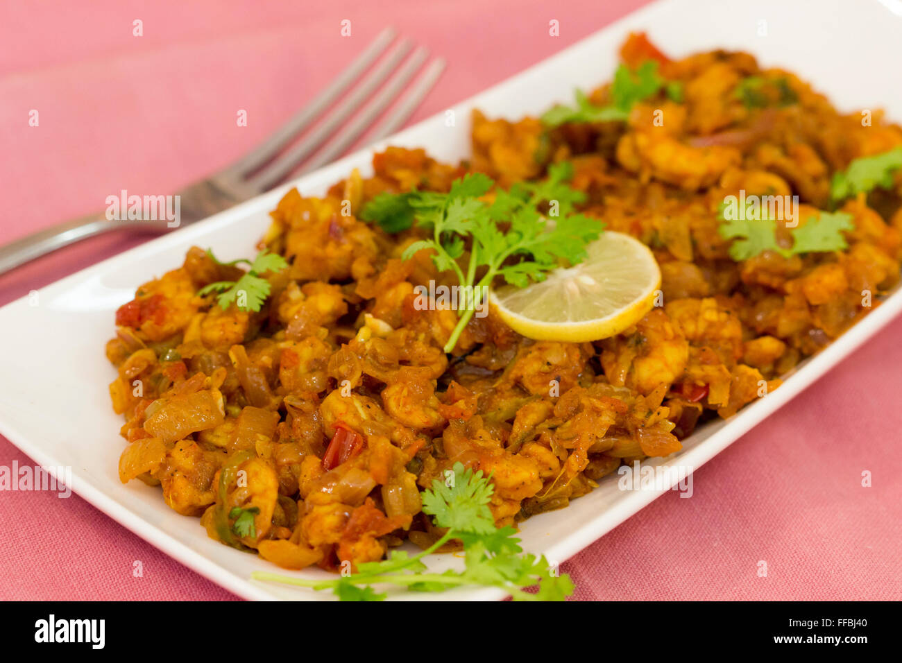 Goa is known for its seafood and goan chilli prawns is a stir fried ...