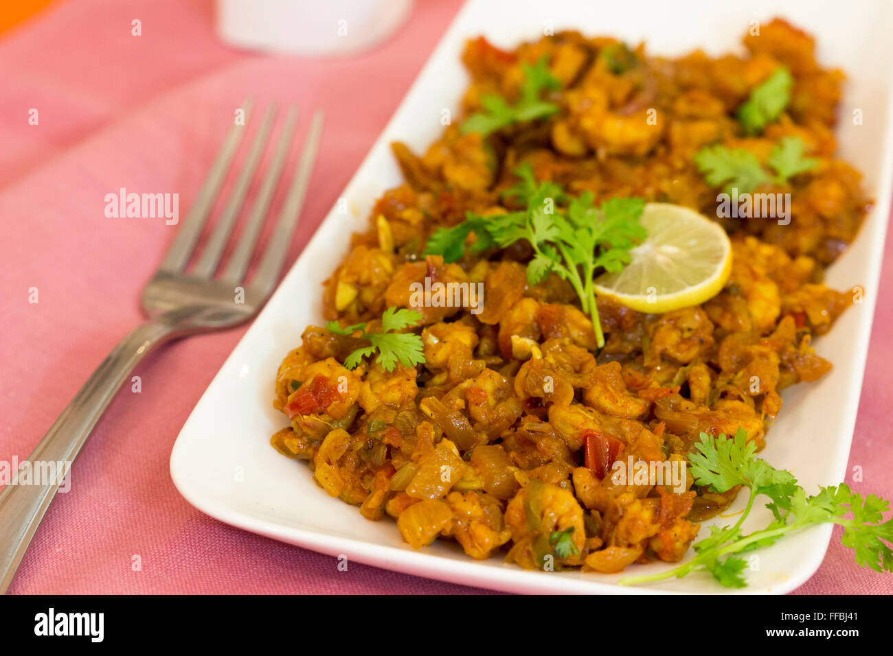 Goa is known for its seafood and goan chilli prawns is a stir fried ...