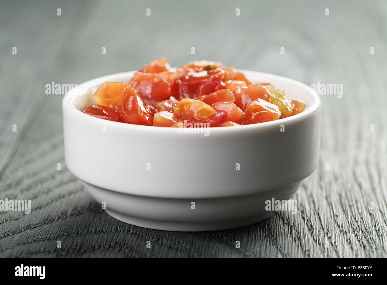 canned salsa dip in bowl on wood table Stock Photo - Alamy
