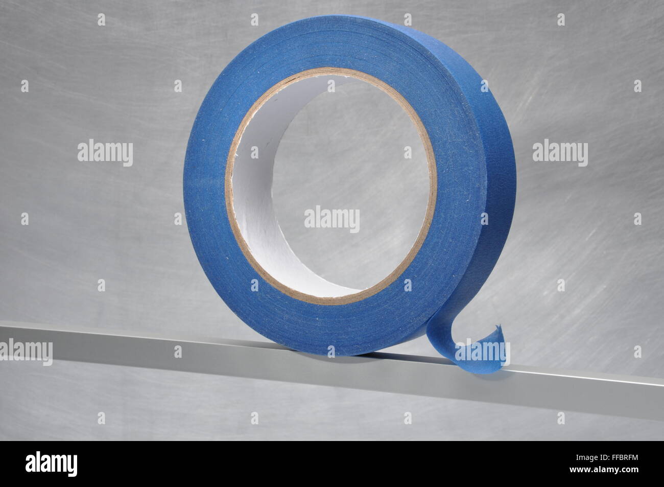 Roll of blue masking tape Stock Photo - Alamy