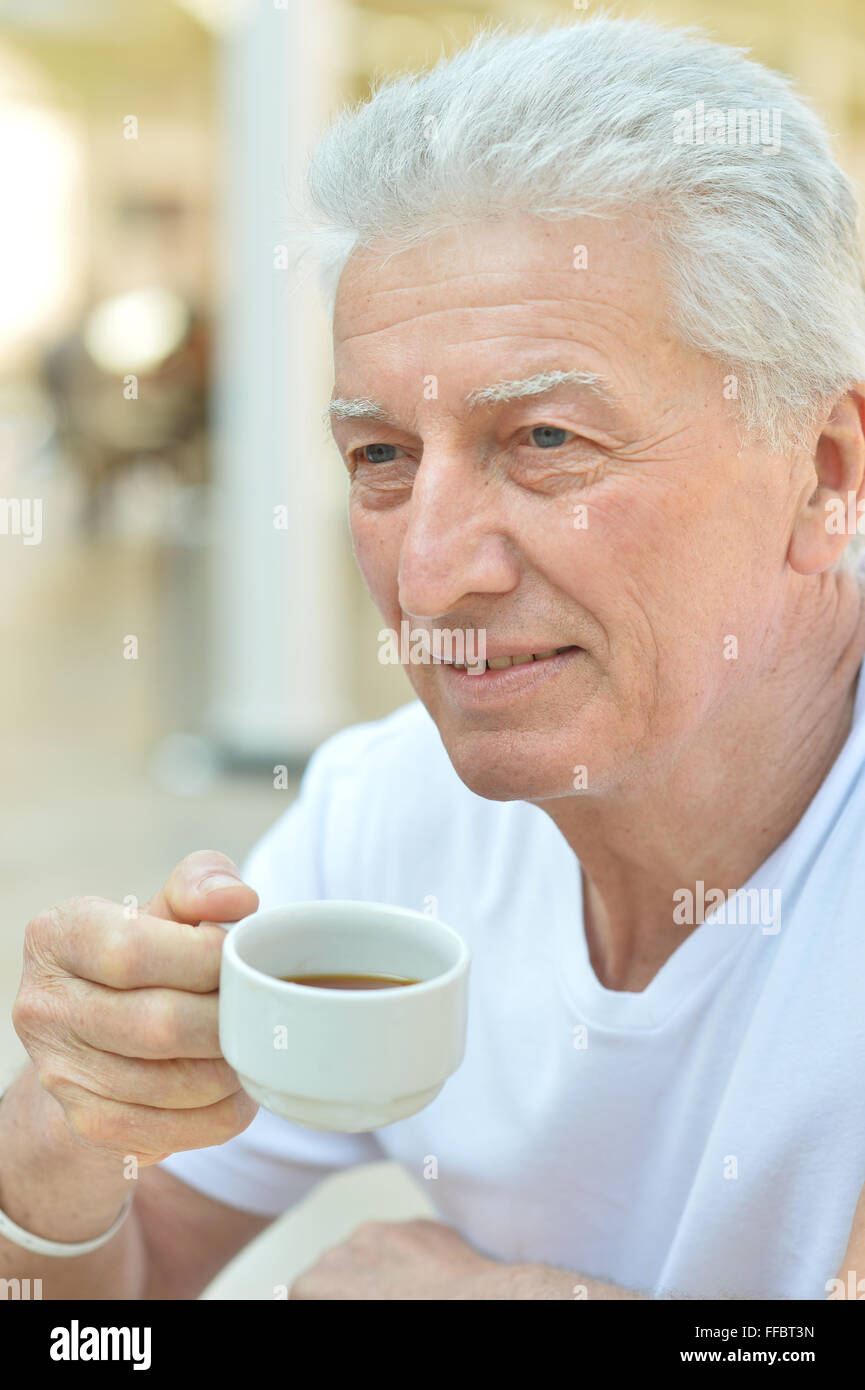 Man with cup of coffee Stock Photo - Alamy