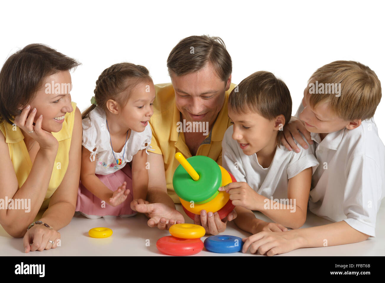 family playing with toy Stock Photo - Alamy