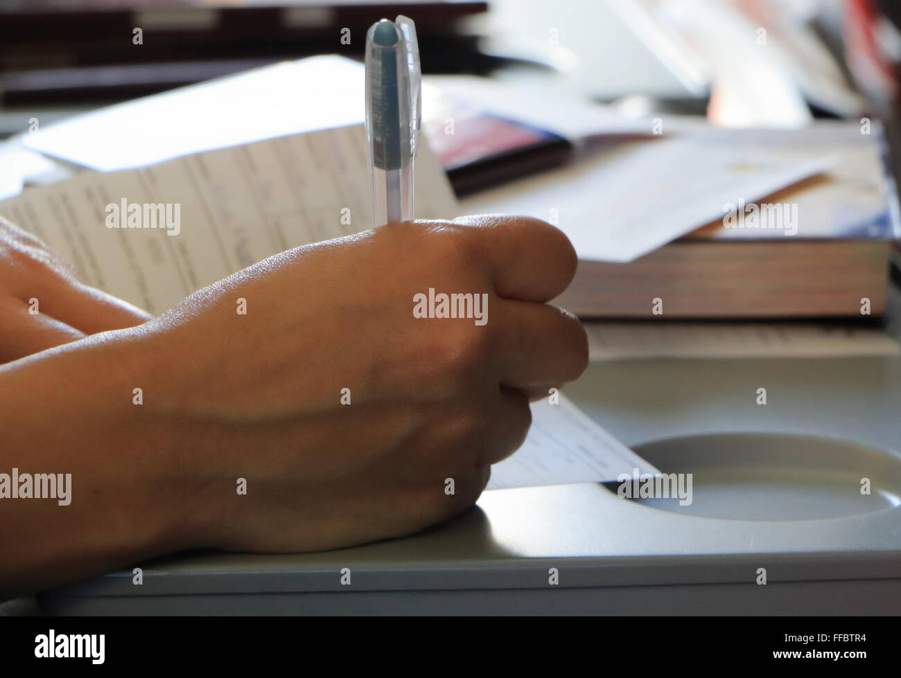 Hand applying application form hi-res stock photography and images - Alamy